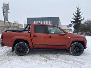 Orange Volkswagen Amarok 2015 in Taurage, with an engine capacity of 1.97 L and mileage of 232 thousand km for 14900 €, photo 12 on AUTOMOTO.COM.LV