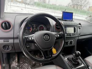 Orange Volkswagen Amarok 2015 in Taurage, with an engine capacity of 1.97 L and mileage of 232 thousand km for 14900 €, photo 16 on AUTOMOTO.COM.LV
