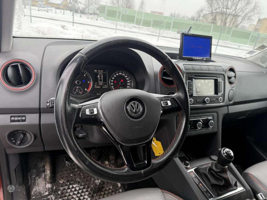 Orange Volkswagen Amarok 2015 in Taurage, with an engine capacity of 1.97 L and mileage of 232 thousand km for 14900 €, photo 16 on AUTOMOTO.COM.LV