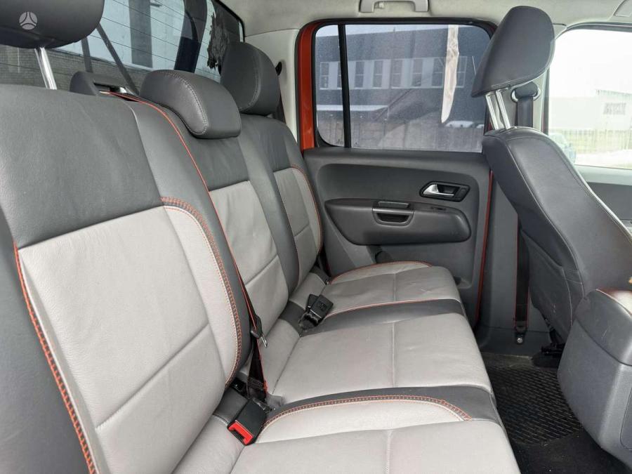 Orange Volkswagen Amarok 2015 in Taurage, with an engine capacity of 1.97 L and mileage of 232 thousand km for 14900 €, photo 18 on AUTOMOTO.COM.LV