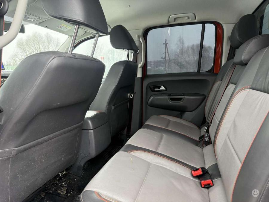 Orange Volkswagen Amarok 2015 in Taurage, with an engine capacity of 1.97 L and mileage of 232 thousand km for 14900 €, photo 21 on AUTOMOTO.COM.LV