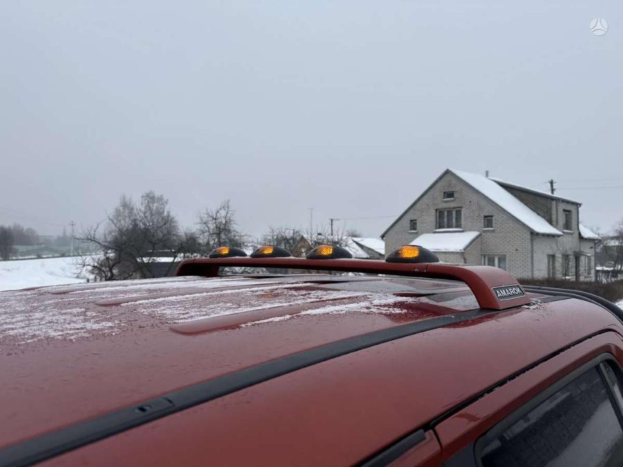 Orange Volkswagen Amarok 2015 in Taurage, with an engine capacity of 1.97 L and mileage of 232 thousand km for 14900 €, photo 25 on AUTOMOTO.COM.LV