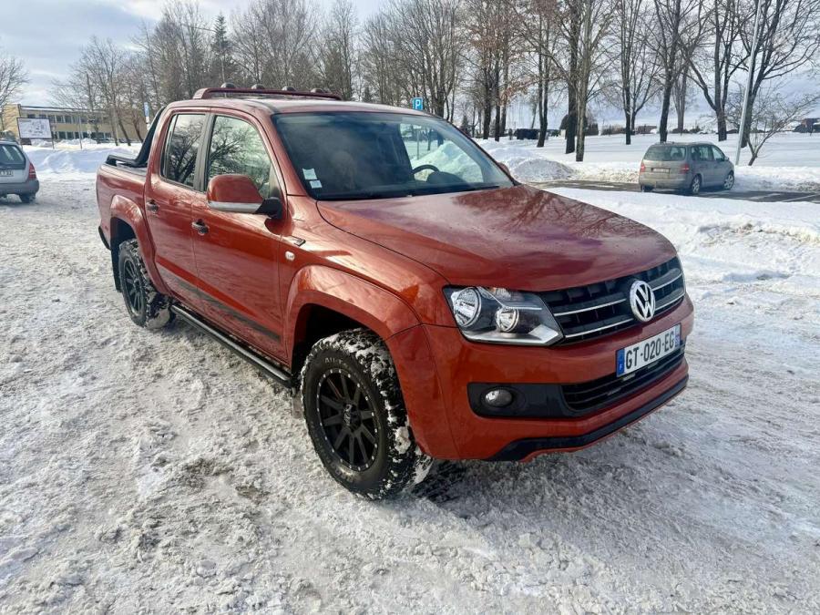 Orange Volkswagen Amarok 2015 in Taurage, with an engine capacity of 1.97 L and mileage of 230 thousand km for 14700 €, photo 1 on AUTOMOTO.COM.LV