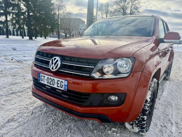 Orange Volkswagen Amarok 2015 in Taurage, with an engine capacity of 1.97 L and mileage of 230 thousand km for 14700 €, photo 4 on AUTOMOTO.COM.LV