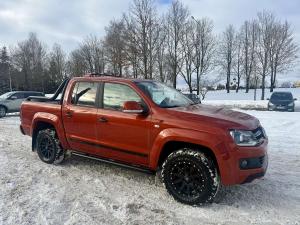 Orange Volkswagen Amarok 2015 in Taurage, with an engine capacity of 1.97 L and mileage of 230 thousand km for 14700 €, photo 5 on AUTOMOTO.COM.LV