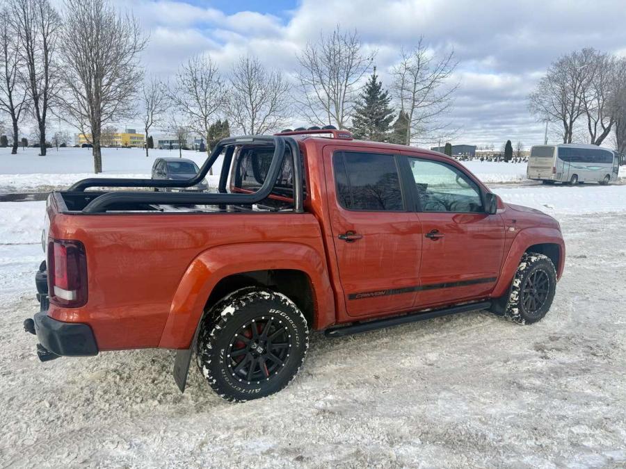 Orange Volkswagen Amarok 2015 in Taurage, with an engine capacity of 1.97 L and mileage of 230 thousand km for 14700 €, photo 6 on AUTOMOTO.COM.LV