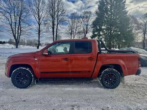 Orange Volkswagen Amarok 2015 in Taurage, with an engine capacity of 1.97 L and mileage of 230 thousand km for 14700 €, photo 7 on AUTOMOTO.COM.LV