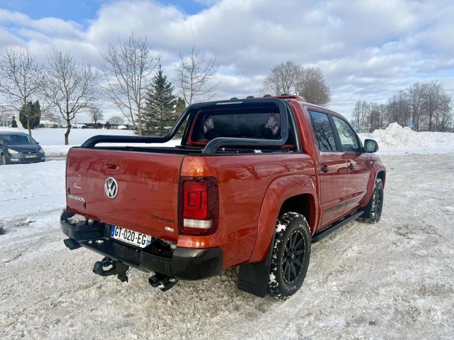 Orange Volkswagen Amarok 2015 in Taurage, with an engine capacity of 1.97 L and mileage of 230 thousand km for 14700 €, photo 8 on AUTOMOTO.COM.LV