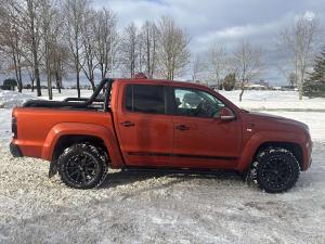 Orange Volkswagen Amarok 2015 in Taurage, with an engine capacity of 1.97 L and mileage of 230 thousand km for 14700 €, photo 11 on AUTOMOTO.COM.LV