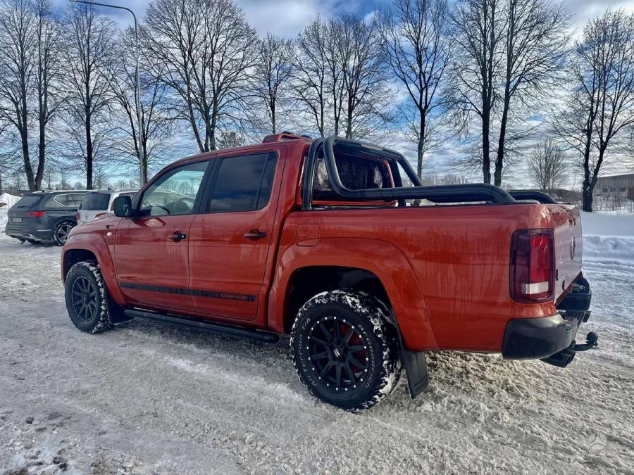 Orange Volkswagen Amarok 2015 in Taurage, with an engine capacity of 1.97 L and mileage of 230 thousand km for 14700 €, photo 12 on AUTOMOTO.COM.LV