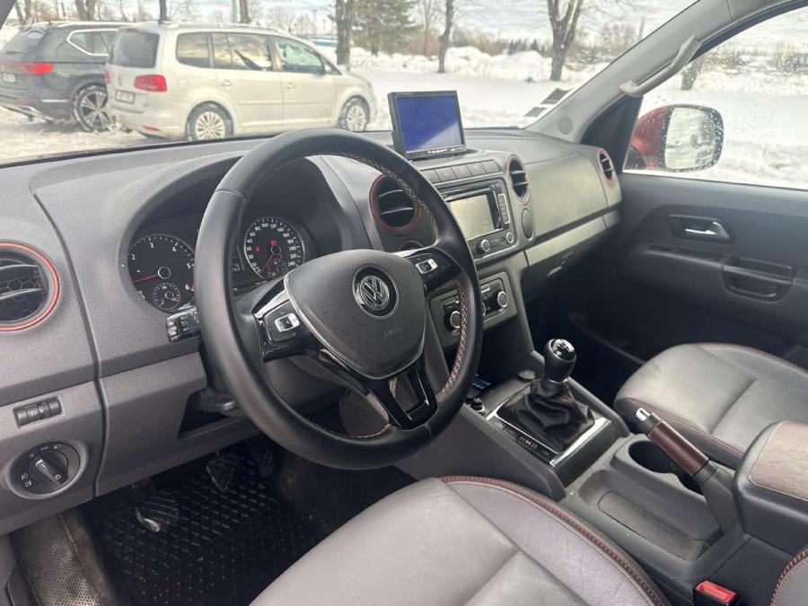 Orange Volkswagen Amarok 2015 in Taurage, with an engine capacity of 1.97 L and mileage of 230 thousand km for 14700 €, photo 14 on AUTOMOTO.COM.LV