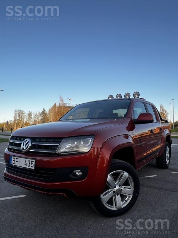 Orange Volkswagen Amarok 2016 in Cesis, with an engine capacity of 2.00 L and mileage of 263 thousand km for 17700 €, photo 2 on AUTOMOTO.COM.LV