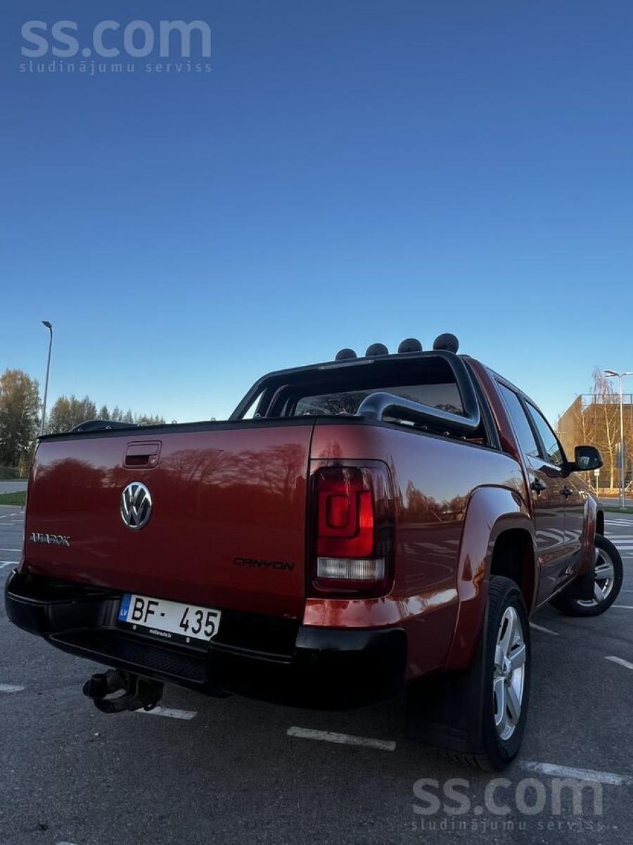 Orange Volkswagen Amarok 2016 in Cesis, with an engine capacity of 2.00 L and mileage of 263 thousand km for 17700 €, photo 4 on AUTOMOTO.COM.LV