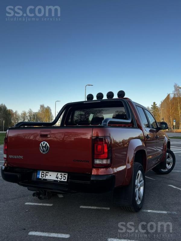 Orange Volkswagen Amarok 2016 in Cesis, with an engine capacity of 2.00 L and mileage of 263 thousand km for 17700 €, photo 5 on AUTOMOTO.COM.LV