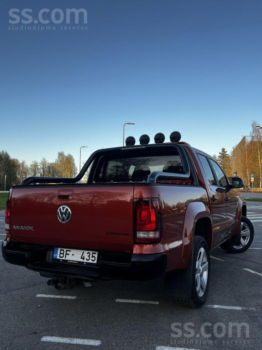 Orange Volkswagen Amarok 2016 in Cesis, with an engine capacity of 2.00 L and mileage of 263 thousand km for 17700 €, photo 6 on AUTOMOTO.COM.LV