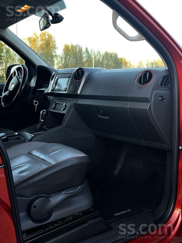 Orange Volkswagen Amarok 2016 in Cesis, with an engine capacity of 2.00 L and mileage of 263 thousand km for 17700 €, photo 6 on AUTOMOTO.COM.LV