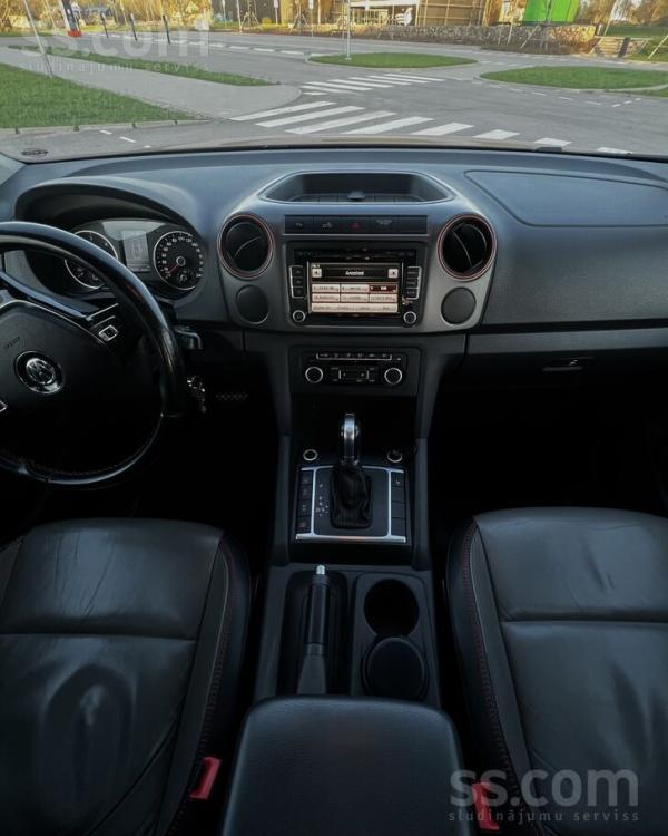 Orange Volkswagen Amarok 2016 in Cesis, with an engine capacity of 2.00 L and mileage of 263 thousand km for 17700 €, photo 7 on AUTOMOTO.COM.LV