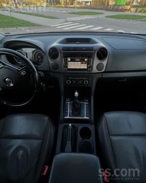 Orange Volkswagen Amarok 2016 in Cesis, with an engine capacity of 2.00 L and mileage of 263 thousand km for 17700 €, photo 8 on AUTOMOTO.COM.LV