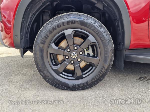 Red Volkswagen Amarok 2024 in Tallinn, with an engine capacity of 3.00 L and mileage of 97 thousand km for 49900 €, photo 10 on AUTOMOTO.COM.LV