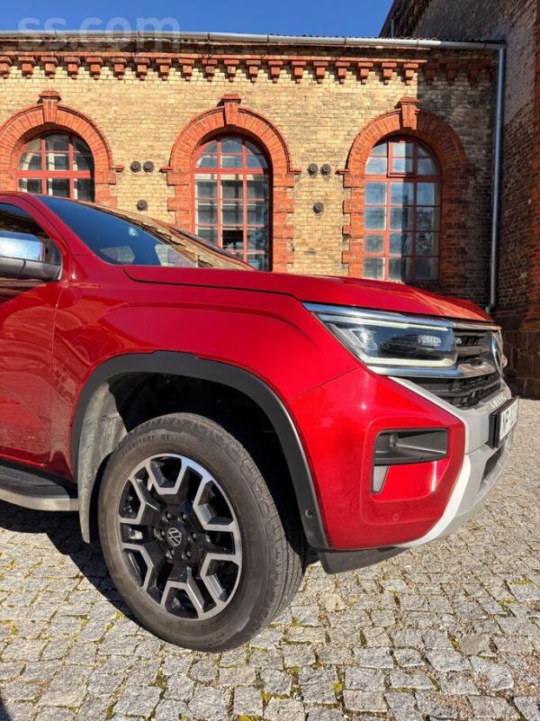 Red Volkswagen Amarok 2023 in Ventspils, with an engine capacity of 3.00 L and mileage of 113 thousand km for 43990 €, photo 5 on AUTOMOTO.COM.LV
