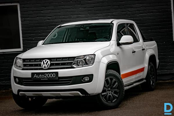 White Volkswagen Amarok 2013 in Tukums, with an engine capacity of 2.00 L and mileage of 249 thousand km for 15990 €, photo 1 on AUTOMOTO.COM.LV