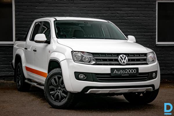 White Volkswagen Amarok 2013 in Tukums, with an engine capacity of 2.00 L and mileage of 249 thousand km for 15990 €, photo 3 on AUTOMOTO.COM.LV