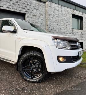 White Volkswagen Amarok 2014 in Tallinn, with an engine capacity of 2.00 L and mileage of 274 thousand km for 12990 €, photo 5 on AUTOMOTO.COM.LV