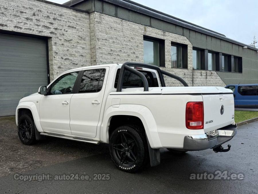 White Volkswagen Amarok 2014 in Tallinn, with an engine capacity of 2.00 L and mileage of 274 thousand km for 12990 €, photo 11 on AUTOMOTO.COM.LV