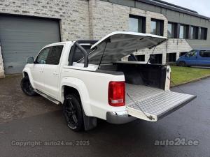 White Volkswagen Amarok 2014 in Tallinn, with an engine capacity of 2.00 L and mileage of 274 thousand km for 12990 €, photo 14 on AUTOMOTO.COM.LV