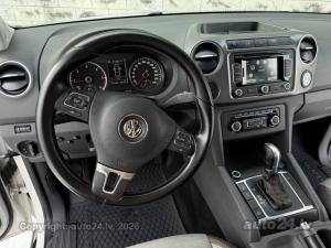 White Volkswagen Amarok 2014 in Tallinn, with an engine capacity of 2.00 L and mileage of 312 thousand km for 11990 €, photo 24 on AUTOMOTO.COM.LV