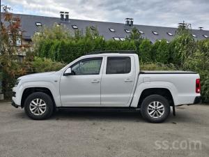 White Volkswagen Amarok 2015 in Riga, with an engine capacity of 2.00 L and mileage of 190 thousand km for 14500 €, photo 3 on AUTOMOTO.COM.LV