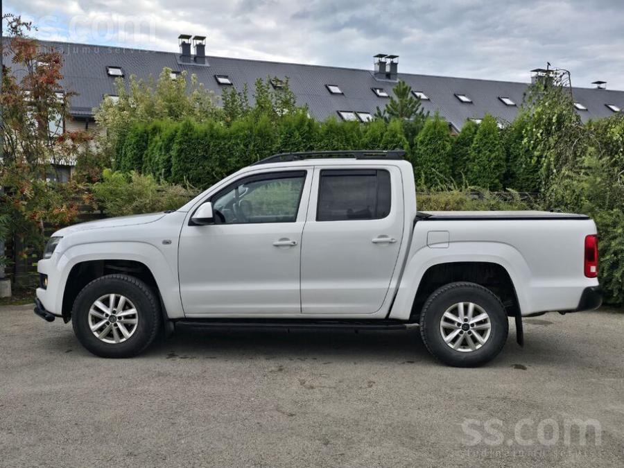 White Volkswagen Amarok 2015 in Riga, with an engine capacity of 2.00 L and mileage of 190 thousand km for 14500 €, photo 3 on AUTOMOTO.COM.LV