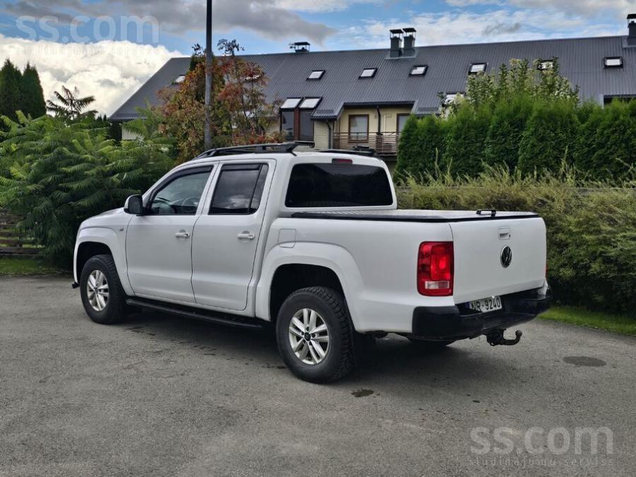 White Volkswagen Amarok 2015 in Riga, with an engine capacity of 2.00 L and mileage of 190 thousand km for 14500 €, photo 4 on AUTOMOTO.COM.LV