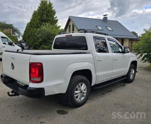 White Volkswagen Amarok 2015 in Riga, with an engine capacity of 2.00 L and mileage of 190 thousand km for 14500 €, photo 6 on AUTOMOTO.COM.LV