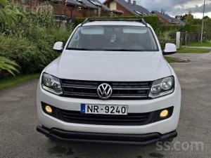 White Volkswagen Amarok 2015 in Riga, with an engine capacity of 2.00 L and mileage of 190 thousand km for 14500 €, photo 8 on AUTOMOTO.COM.LV