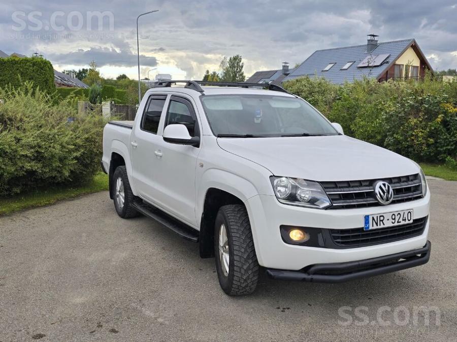 White Volkswagen Amarok 2015 in Riga, with an engine capacity of 2.00 L and mileage of 190 thousand km for 14500 €, photo 9 on AUTOMOTO.COM.LV