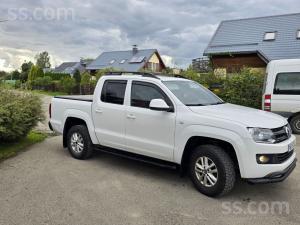 White Volkswagen Amarok 2015 in Riga, with an engine capacity of 2.00 L and mileage of 190 thousand km for 14500 €, photo 10 on AUTOMOTO.COM.LV