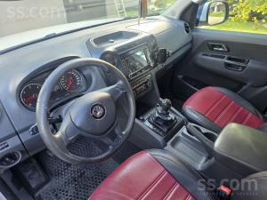 White Volkswagen Amarok 2015 in Riga, with an engine capacity of 2.00 L and mileage of 190 thousand km for 14500 €, photo 11 on AUTOMOTO.COM.LV