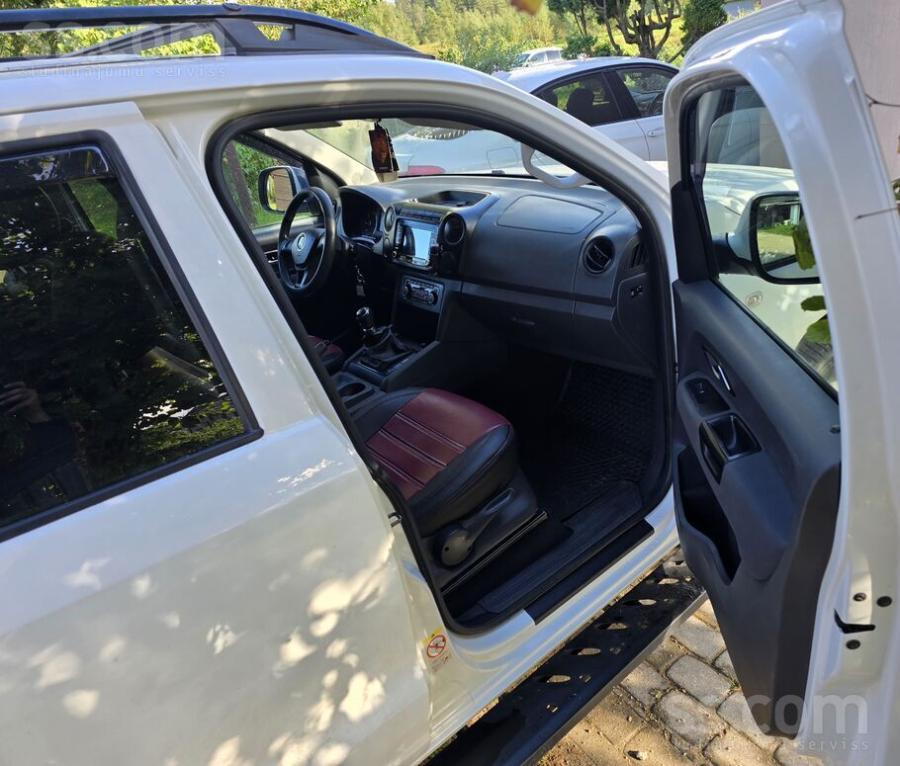 White Volkswagen Amarok 2015 in Riga, with an engine capacity of 2.00 L and mileage of 190 thousand km for 14500 €, photo 12 on AUTOMOTO.COM.LV