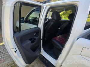 White Volkswagen Amarok 2015 in Riga, with an engine capacity of 2.00 L and mileage of 190 thousand km for 14500 €, photo 14 on AUTOMOTO.COM.LV