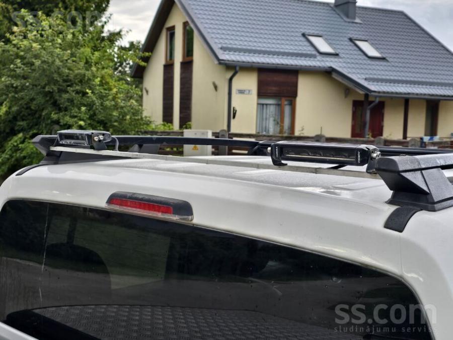 White Volkswagen Amarok 2015 in Riga, with an engine capacity of 2.00 L and mileage of 190 thousand km for 14500 €, photo 16 on AUTOMOTO.COM.LV