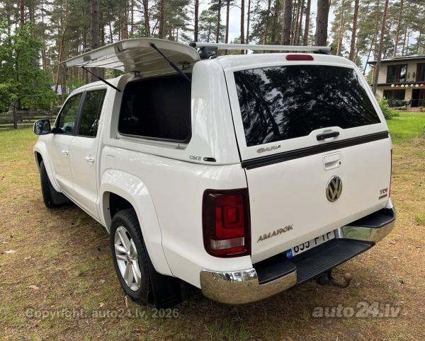 White Volkswagen Amarok 2016 in Tallinn, with an engine capacity of 2.00 L and mileage of 214 thousand km for 18600 €, photo 7 on AUTOMOTO.COM.LV