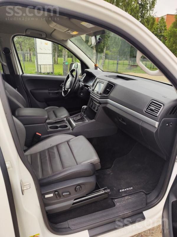 White Volkswagen Amarok 2018 in Kuldiga, with an engine capacity of 3.00 L and mileage of 325 thousand km for 19950 €, photo 7 on AUTOMOTO.COM.LV