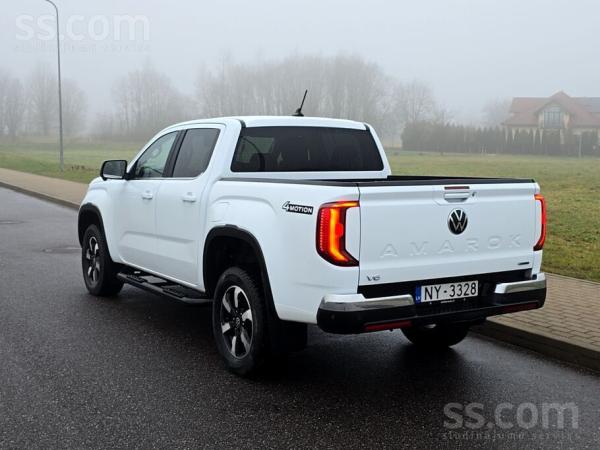 White Volkswagen Amarok 2024 in Riga, with an engine capacity of 3.00 L and mileage of 105 thousand km for 40500 €, photo 3 on AUTOMOTO.COM.LV