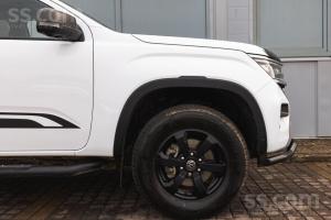 White Volkswagen Amarok 2024 in Ventspils, with an engine capacity of 3.00 L and mileage of 63 thousand km for 49500 €, photo 9 on AUTOMOTO.COM.LV