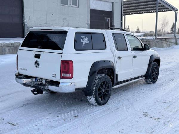 White Volkswagen Amarok 2011 in Vilnius, with an engine capacity of 1.96 L and mileage of 397 thousand km for 6500 €, photo 3 on AUTOMOTO.COM.LV