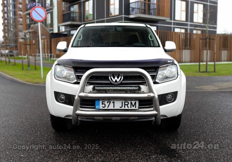 White Volkswagen Amarok 2012 in Tallinn, with an engine capacity of 2.00 L and mileage of 338 thousand km for 8990 €, photo 2 on AUTOMOTO.COM.LV