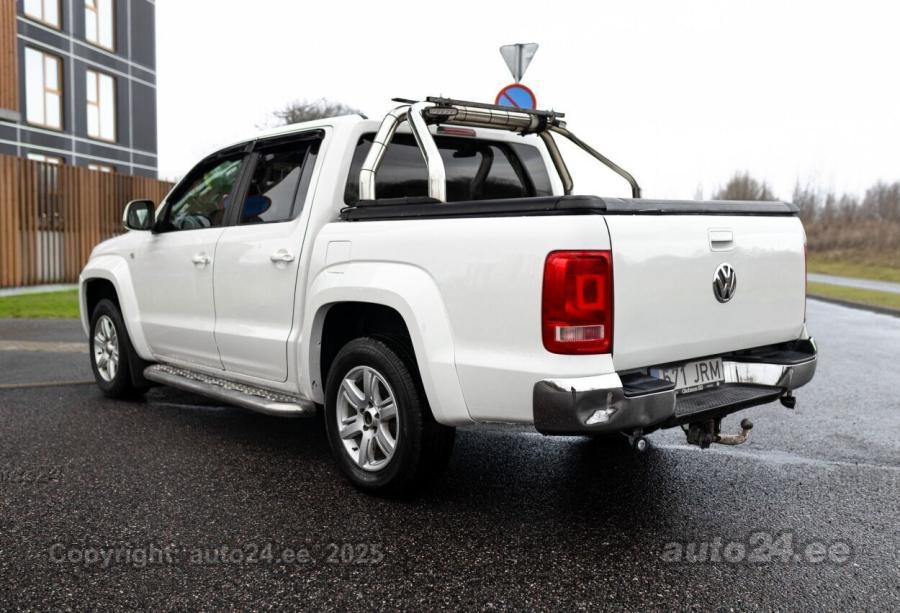 White Volkswagen Amarok 2012 in Tallinn, with an engine capacity of 2.00 L and mileage of 338 thousand km for 8990 €, photo 4 on AUTOMOTO.COM.LV