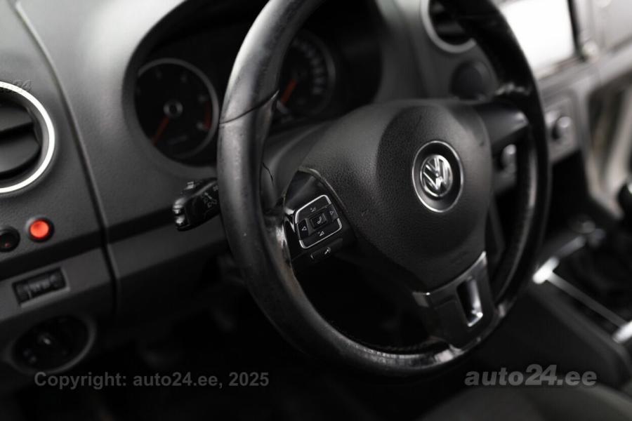 White Volkswagen Amarok 2012 in Tallinn, with an engine capacity of 2.00 L and mileage of 338 thousand km for 8990 €, photo 20 on AUTOMOTO.COM.LV