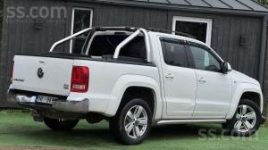 White Volkswagen Amarok 2012 in Riga, with an engine capacity of 2.00 L and mileage of 349 thousand km for 6500 €, photo 4 on AUTOMOTO.COM.LV